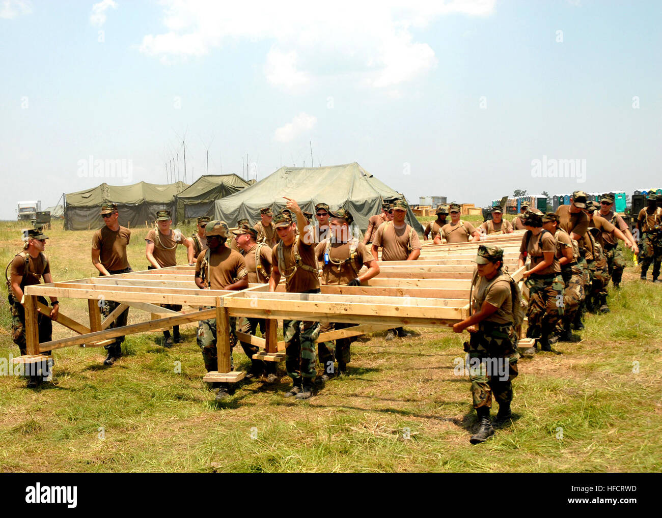 Seabees stationed with Naval Mobile Construction Battalion 1 work as ...