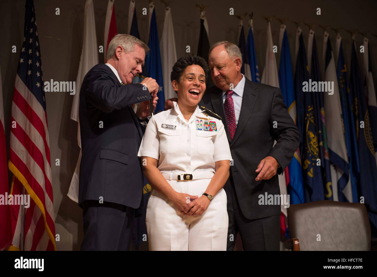 Secretary of the Navy Ray Mabus, left, and Wayne Cowles, husband of Adm ...