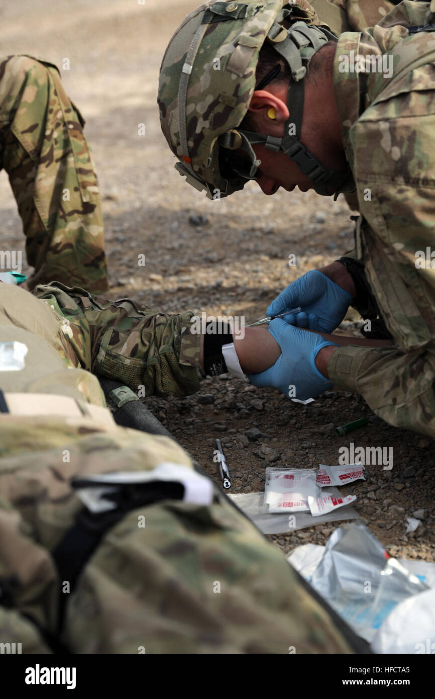 U.S. Army Spc. Nkelo Kurtz, right, medic for Provincial Reconstruction ...