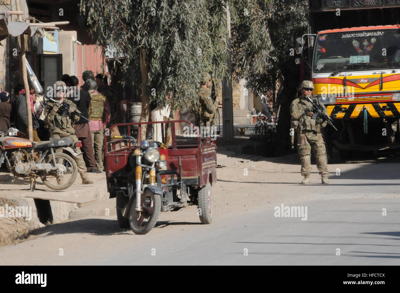 U.S. Army Spc. Matt Cullen, left, Sgt. Sean Luhmann, center, and Capt ...