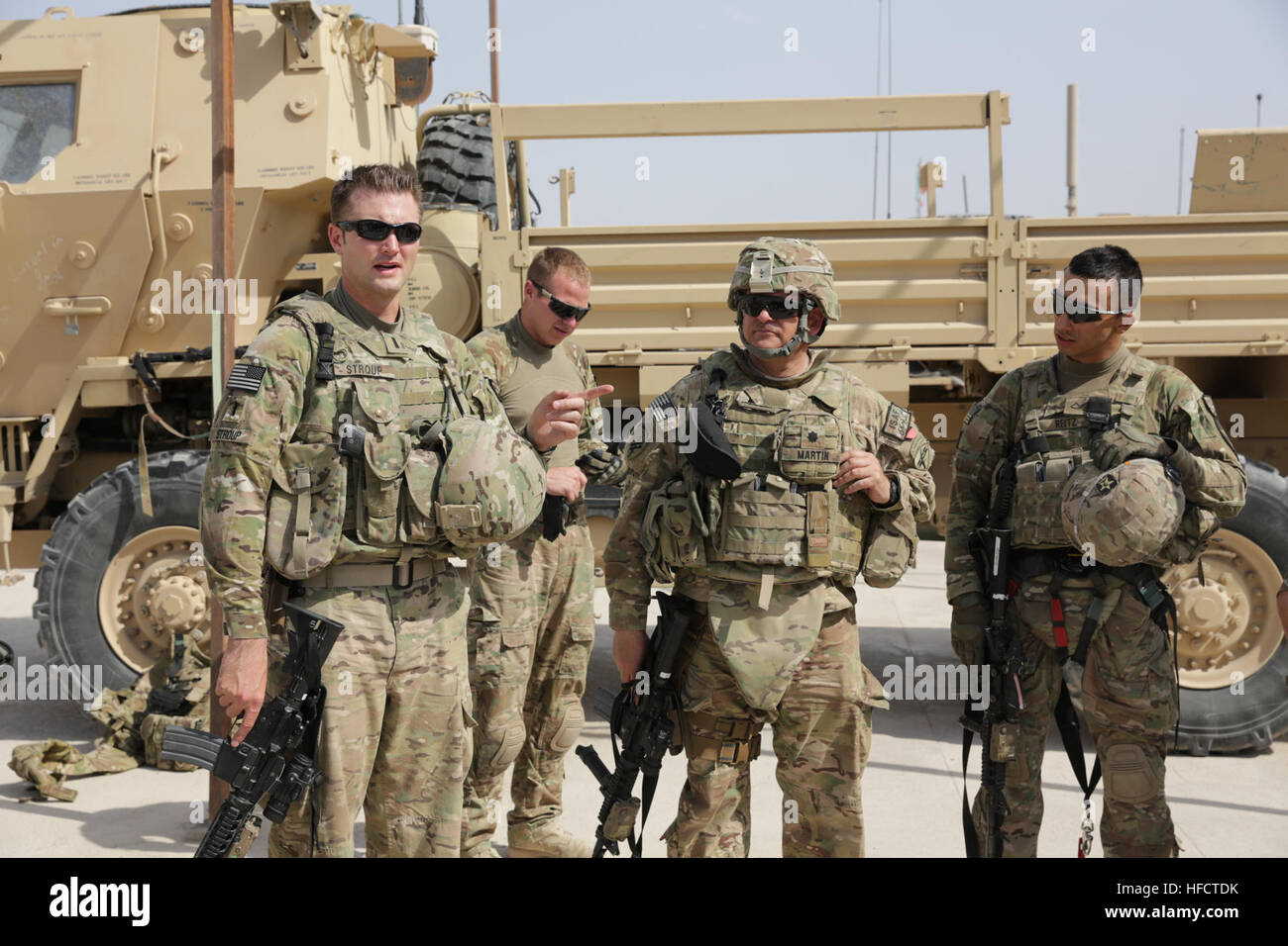 U.S. Navy Lt. j.g. Matthew Stroup, left, education liaison and public ...
