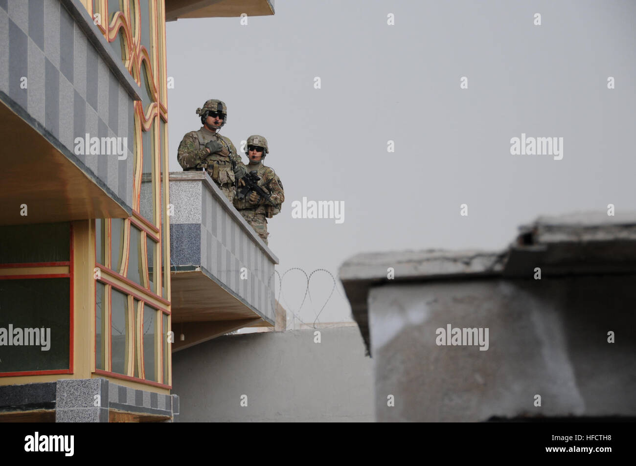 U.S. Army Sgt. 1st Class Sal Somoza and 1st Lt. Robert Wolfe, left to ...