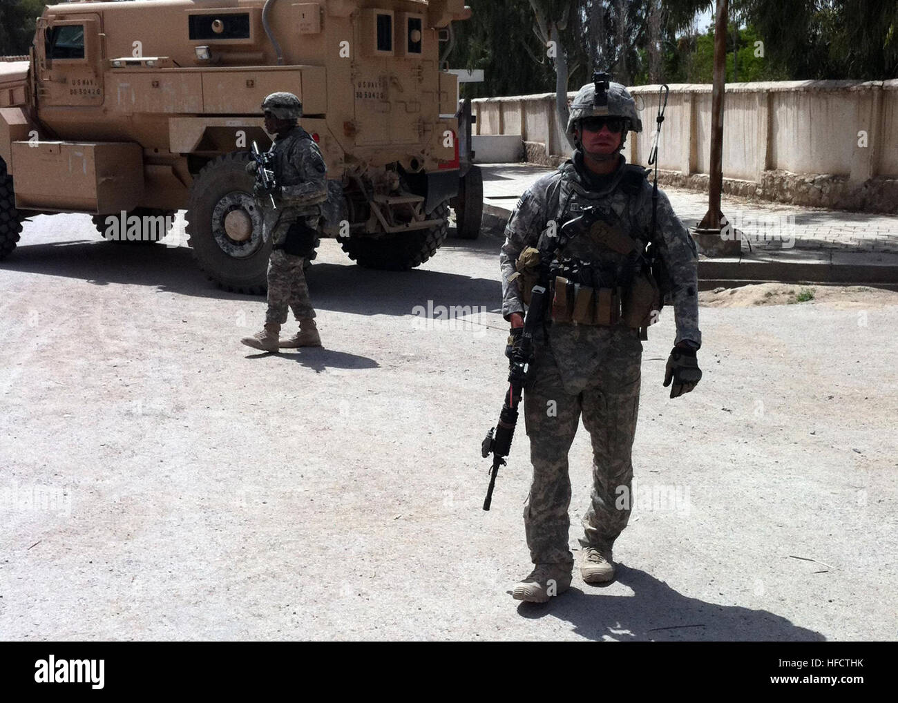 U.S. Army 1st Lt. Michael Lutkevich (right) of Medford, Mass., and ...
