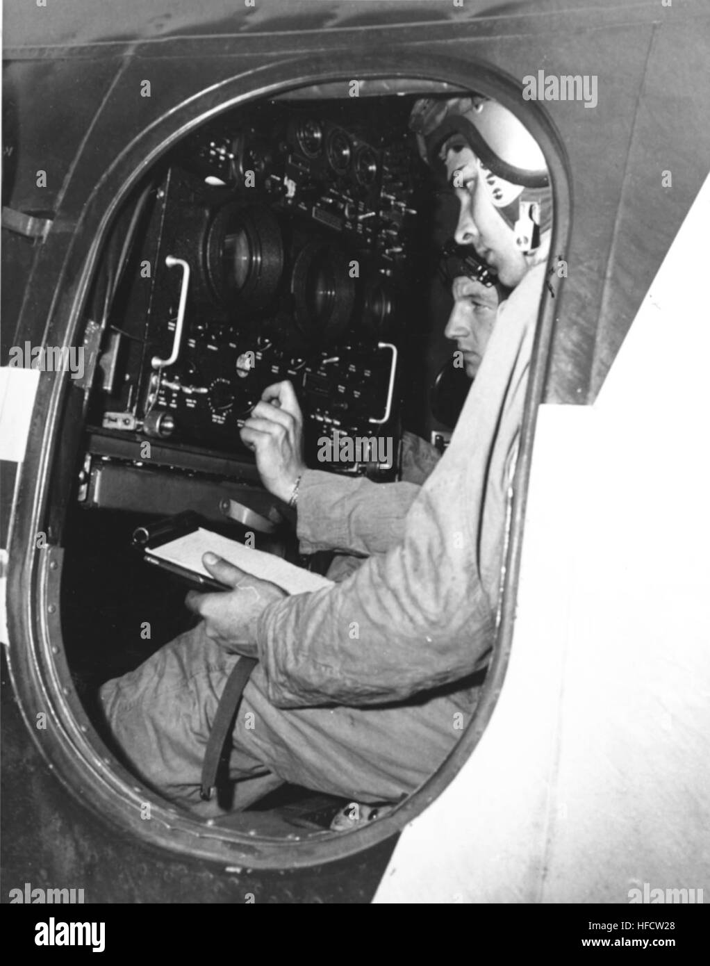 Radar operators in a Douglas AD-3W Skyraider in May 1951 Stock Photo ...