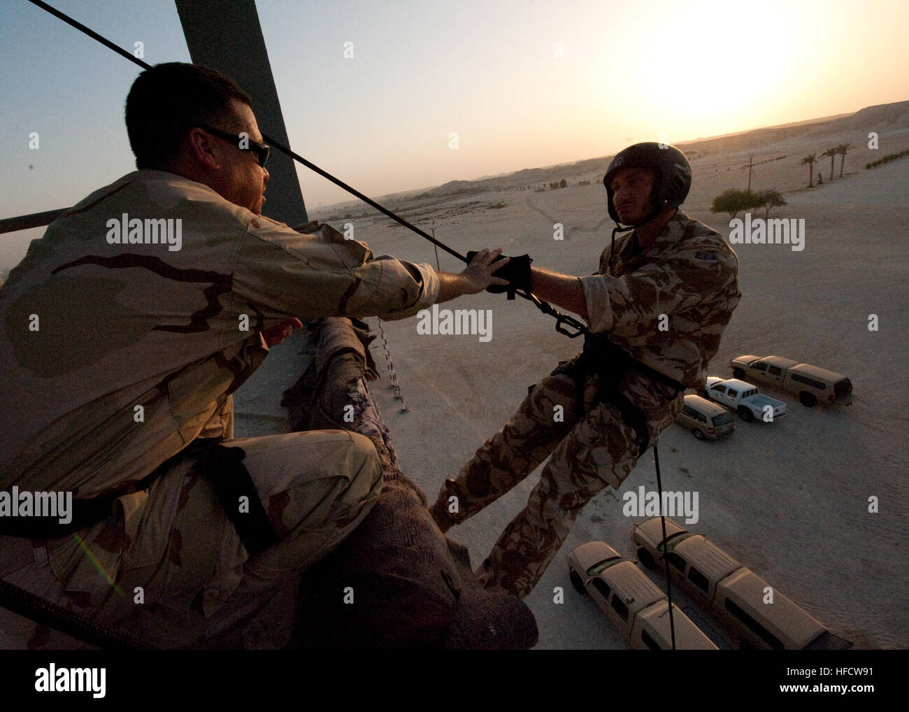 EOD Senior Chief Petty Officer John Hatcher, left, assigned to ...
