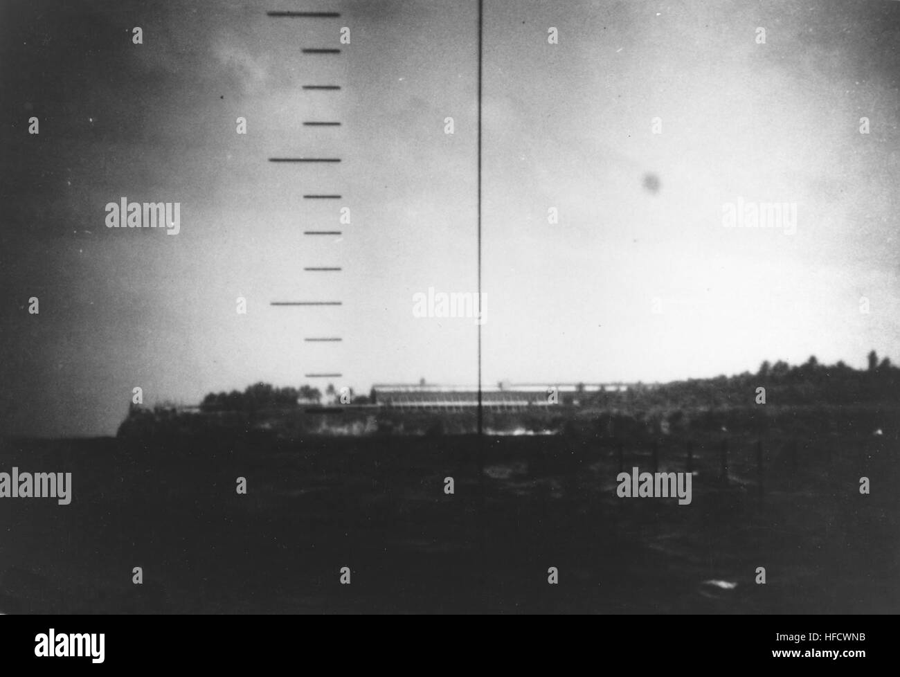 Refinery on Fais island seen through the periscope of USS Wahoo (SS-238 ...