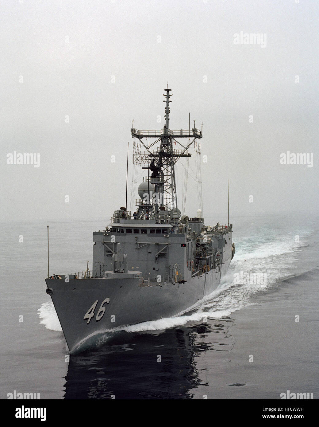 Aerial port bow view of the Oliver Hazard Perry class guided missile ...