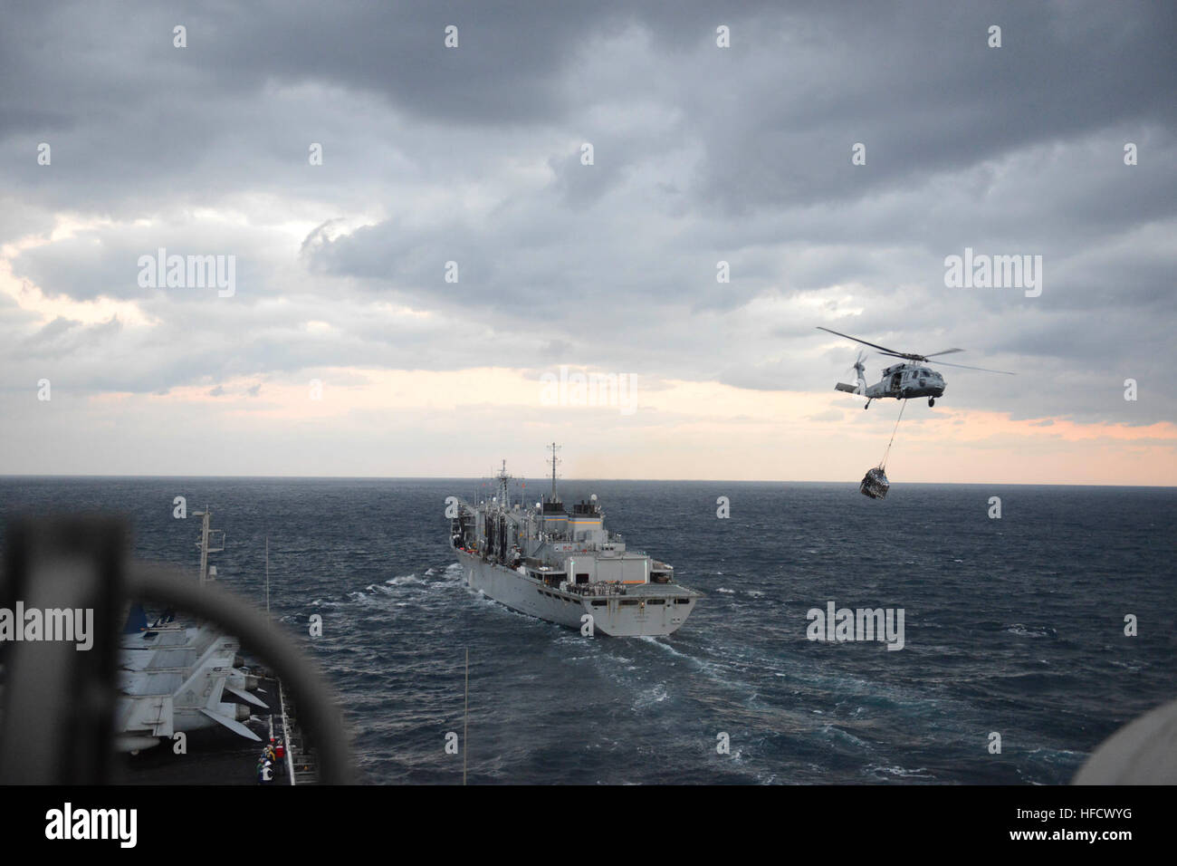 An MH-60S Knighthawk helicopter, assigned to the "Sea Knights" of ...