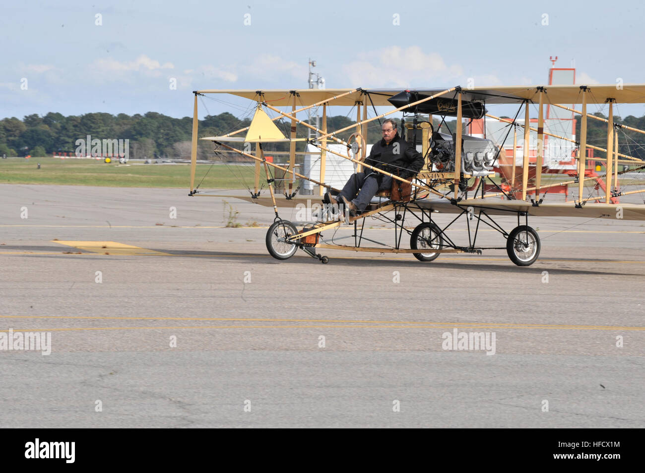 A replica Curtiss bi-plane, like the one flown by Eugene Ely 100 years ...