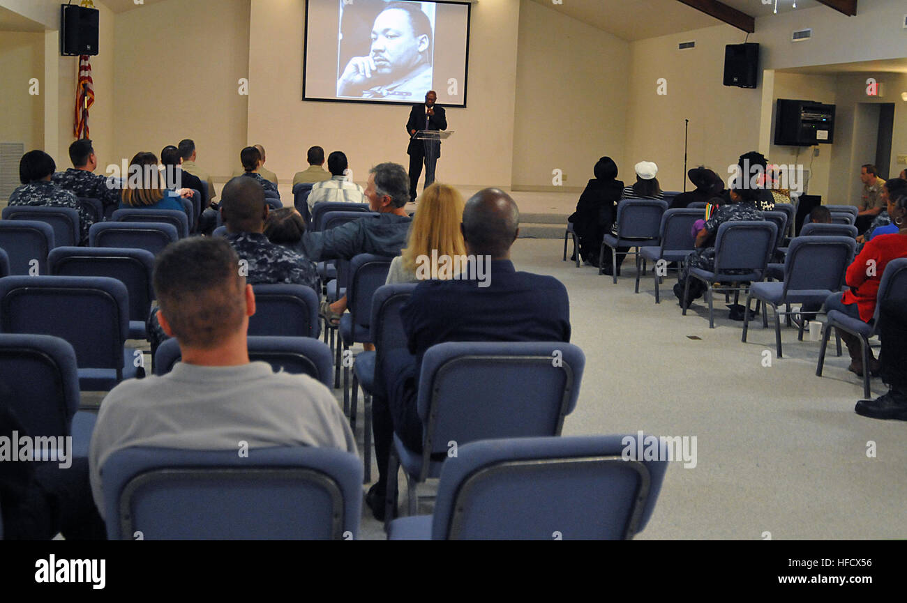 Retired U. S. Air Force Staff Sgt. Hayward Magby, center, speaks during ...