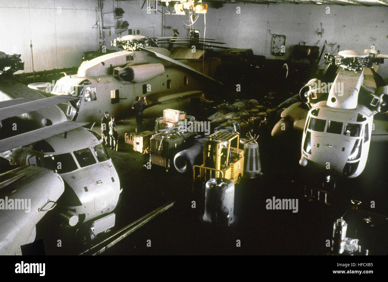 An interior view of the hangar bay aboard the nuclear-powered aircraft ...