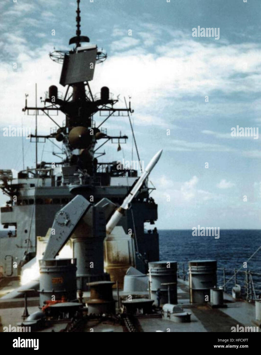 A RIM-67 Standard missile is launched from a Leahy-class guided missile ...