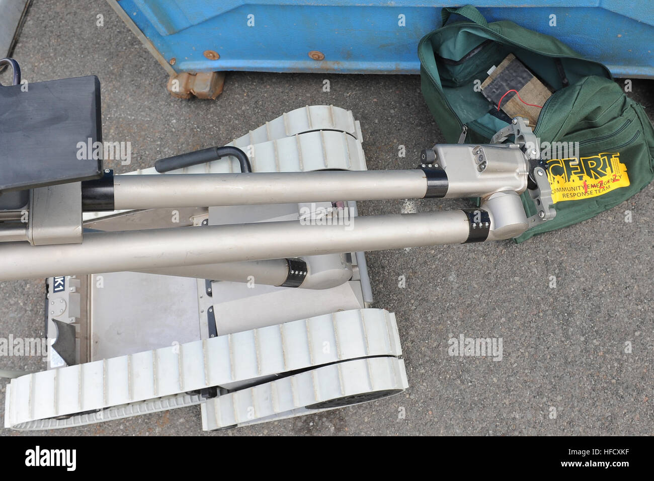 A remote-controlled robot operated by explosive ordnance disposal ...