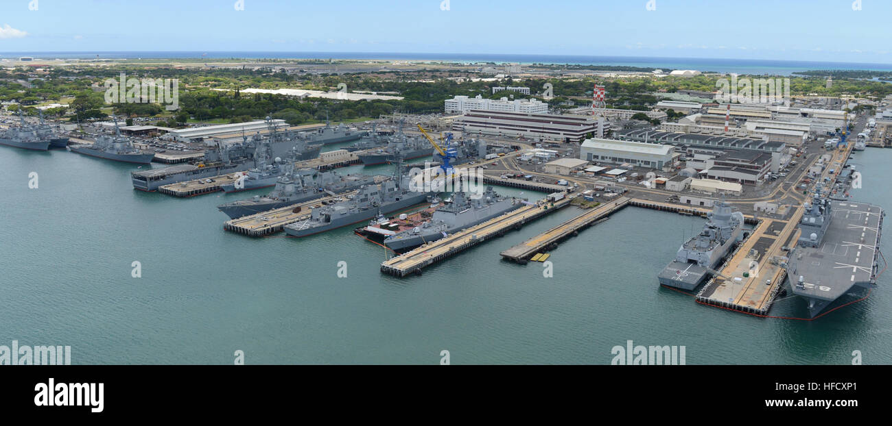 An aerial view of ships moored at Joint Base Pearl Harbor-Hickam during ...