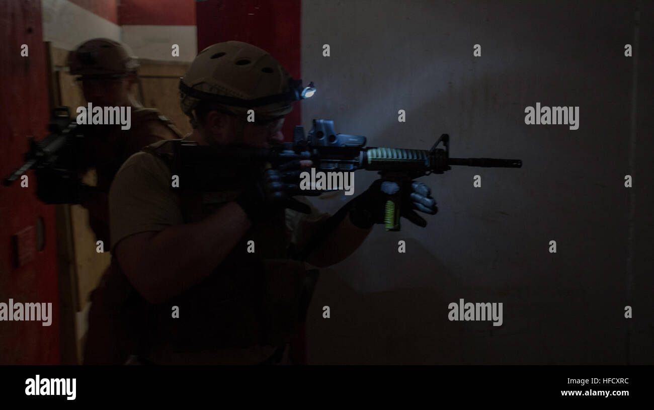 Royal Canadian Navy Clearance Diver Leading Seaman Donny Allen, right ...