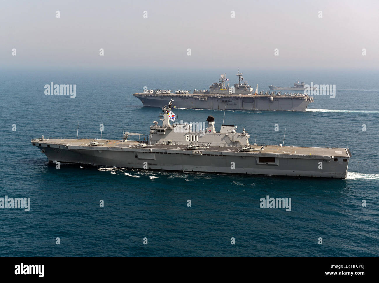 ROKS Dokdo (LPH-6111) and USS Bonhomme Richard (LHD 6) operate together ...