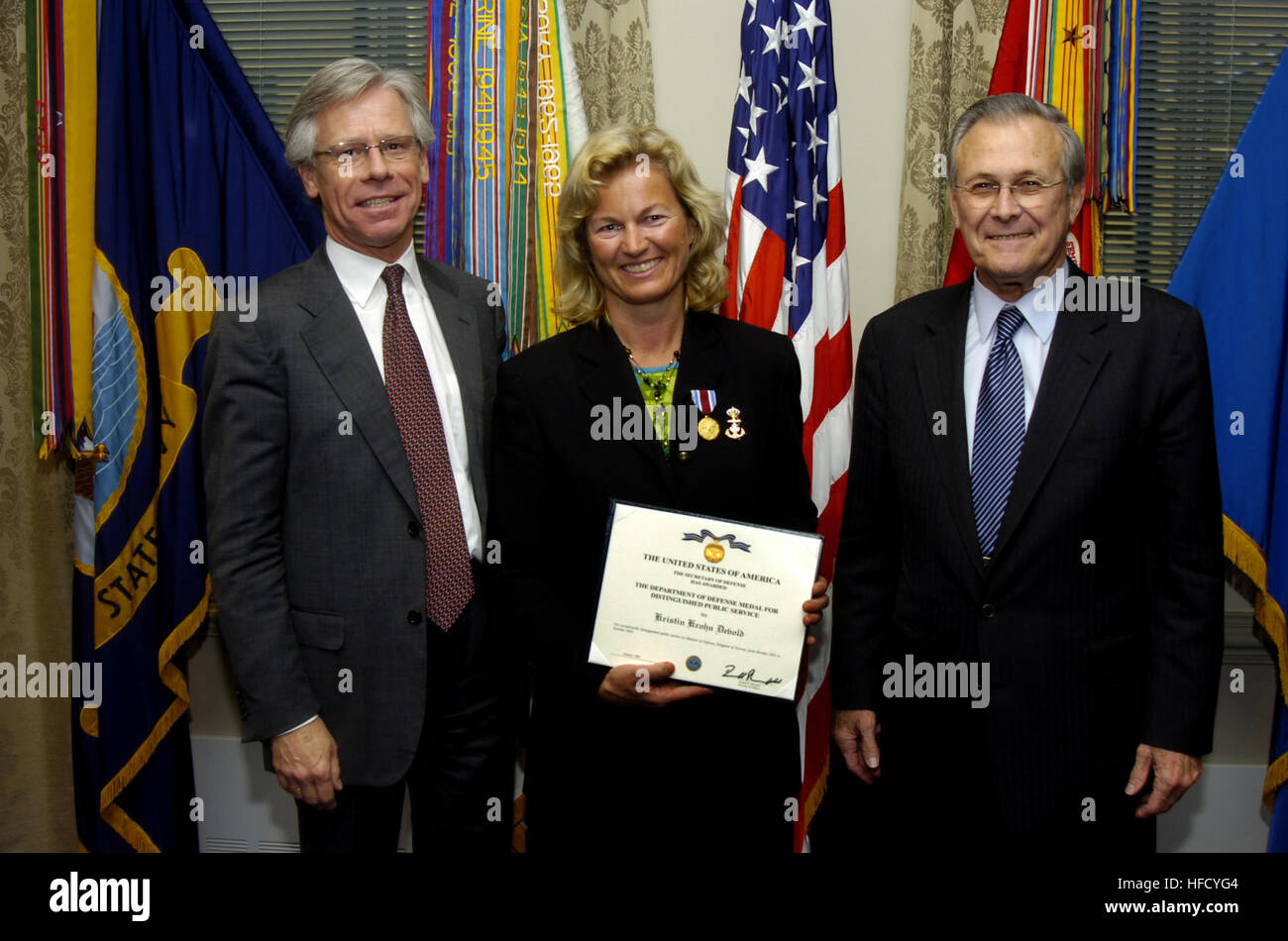 Secretary of Defense Donald H. Rumsfeld, right, stands with former ...