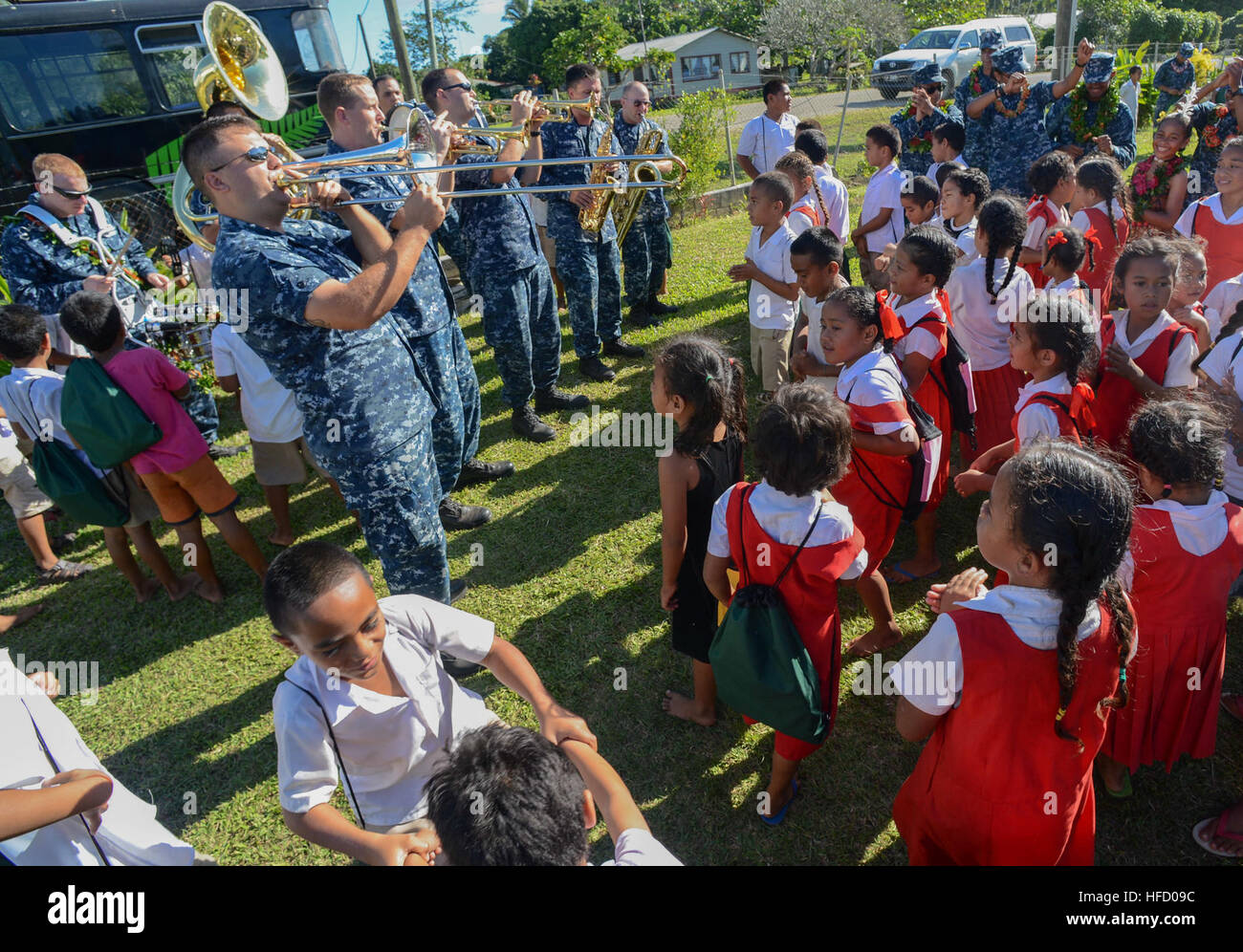 FAHEFA, Tonga (June 18, 2013) The U.S. Pacific Fleet Band entertains Tongan school children ...