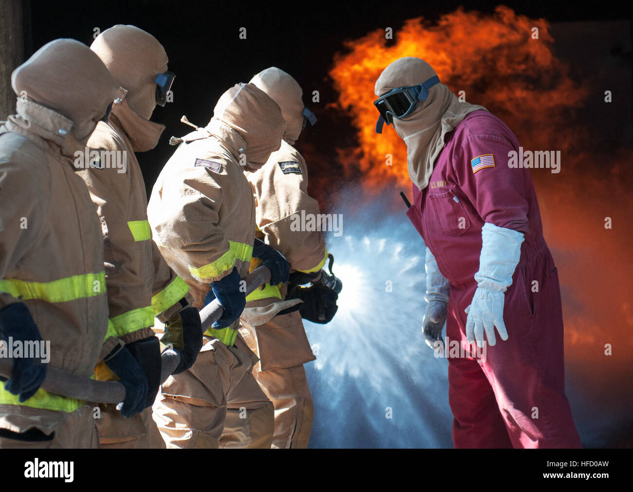 Sailors participate in shipboard firefighting training at Naval Base ...