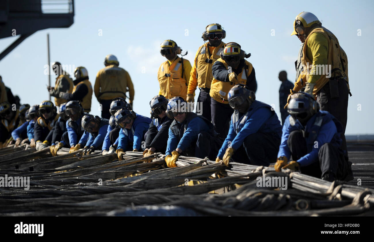 Sailors aboard the Nimitz‑class aircraft carrier USS Carl Vinson ...