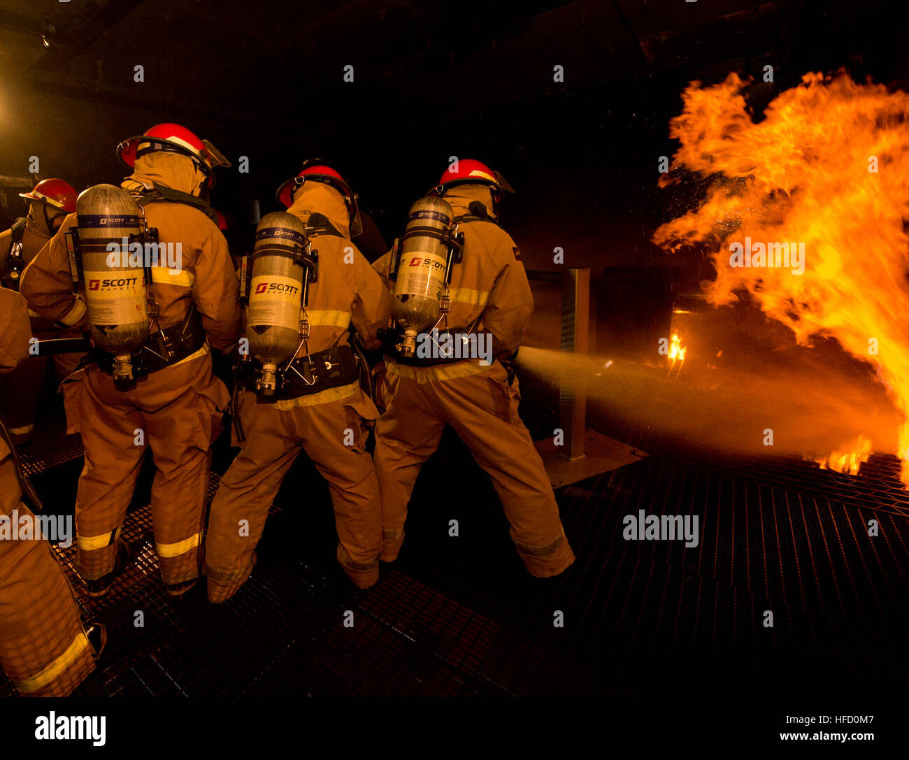 130314-N-BT887-532 SAN DIEGO (March 14, 2013) Sailors fight a fire ...