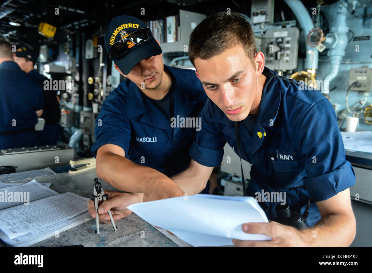ARABIAN GULF (June 20, 2013) Quartermaster Seamen Daniel Mascilli, left ...