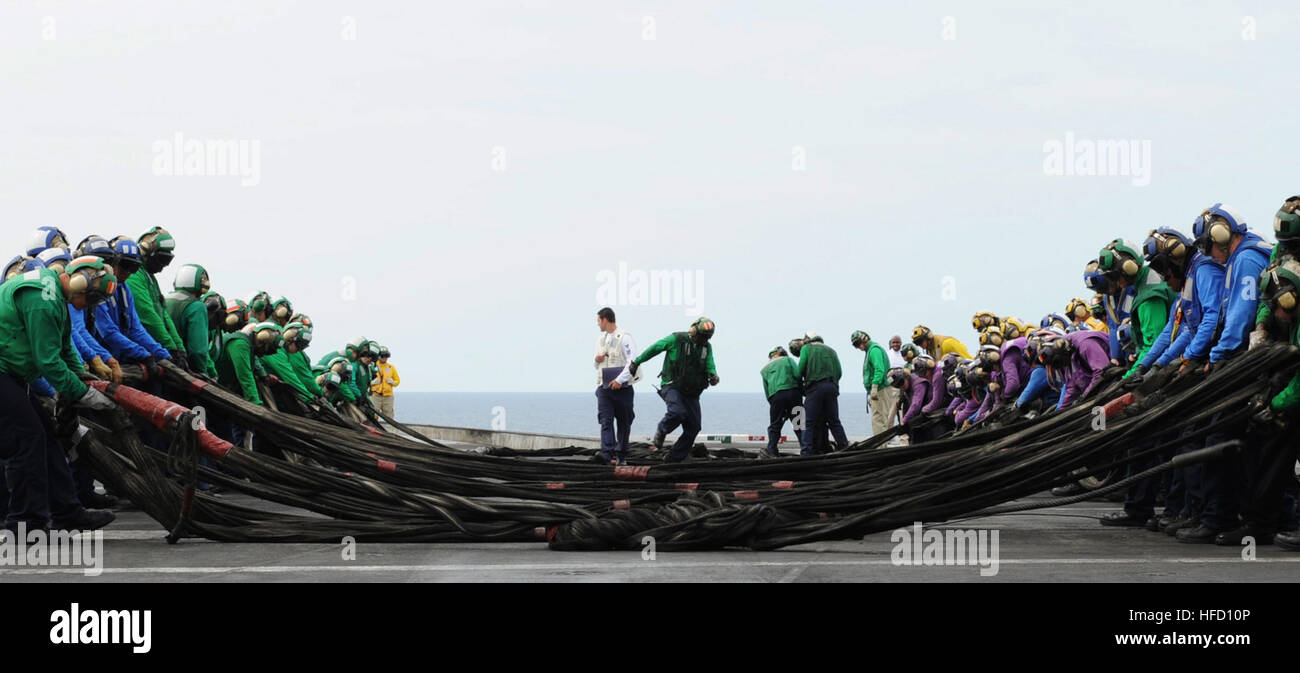 Sailors set up the emergency barricade hi-res stock photography and ...