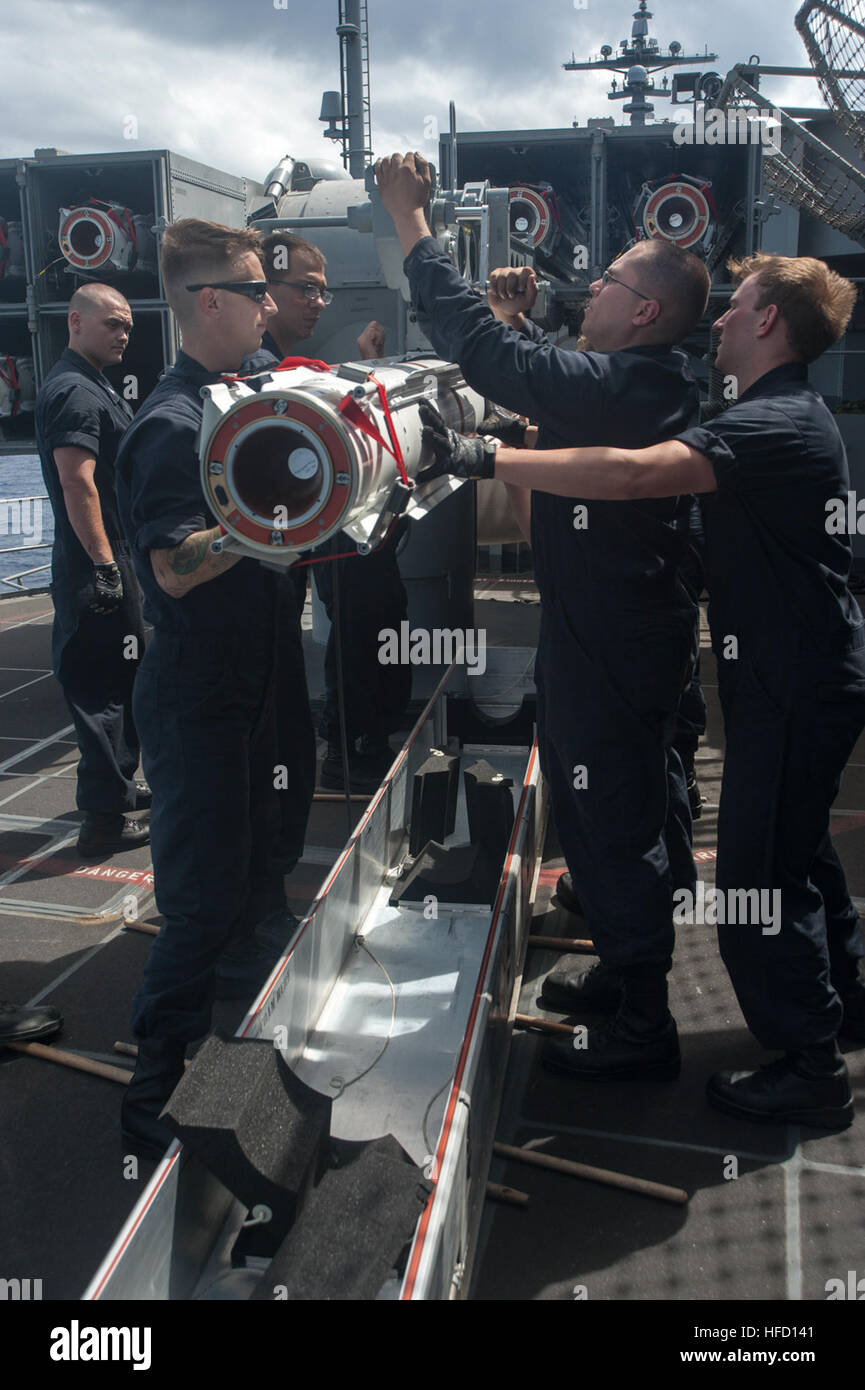 Fire controlmen upload an Evolved Sea Sparrow Missile (ESSM) into a ...