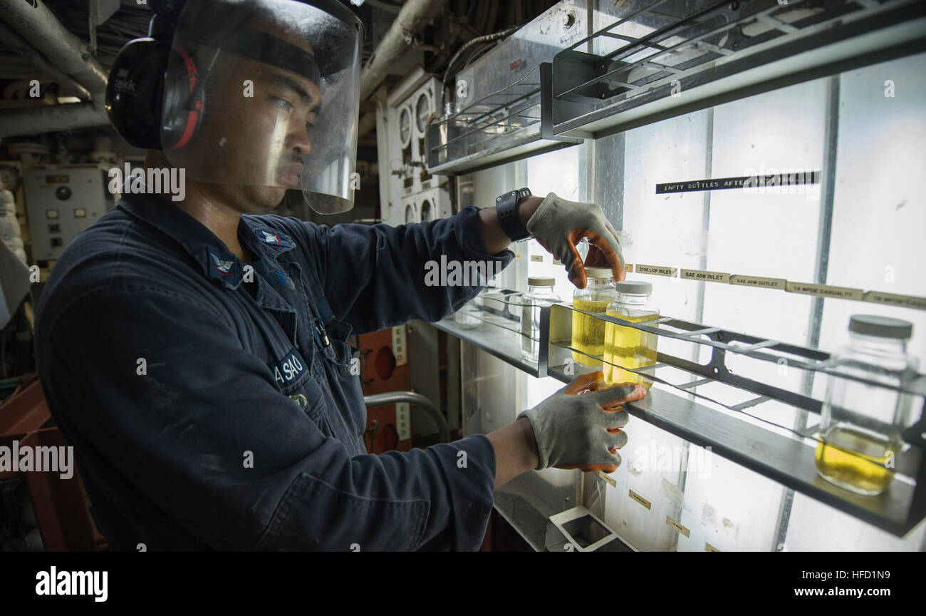 PACIFIC OCEAN (June 29, 2013) Engineman 3rd Class Joseph Casao stores ...