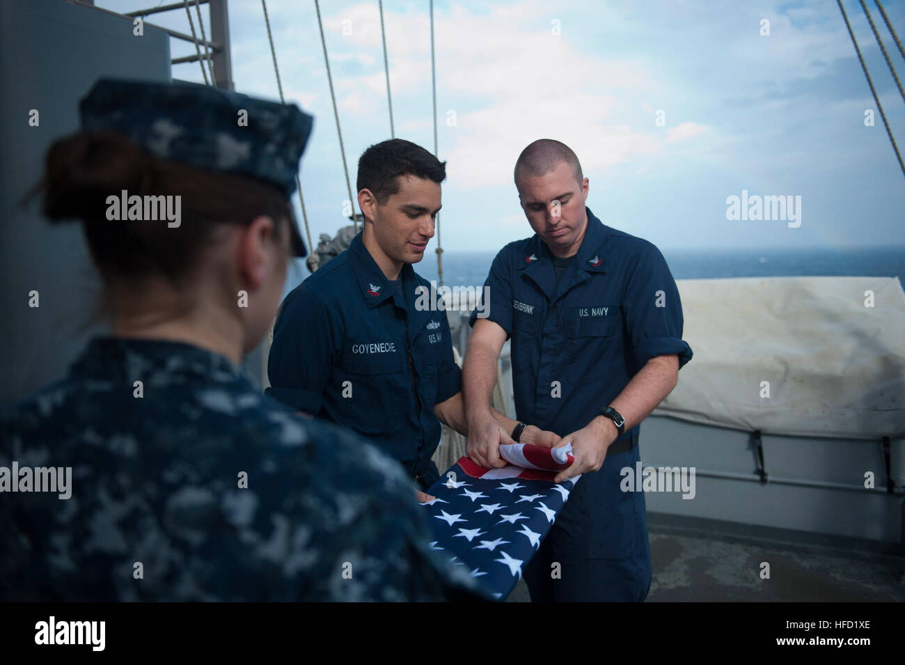 Quartermaster 2nd Class Nicholas Goyeneche, center, and Quartermaster ...