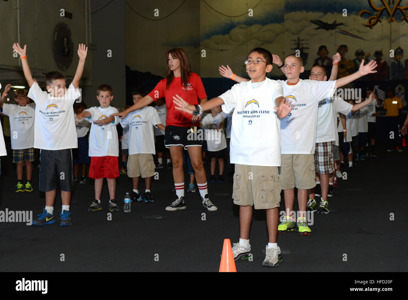 Children of sailors assigned to the aircraft carrier USS Ronald Reagan ...