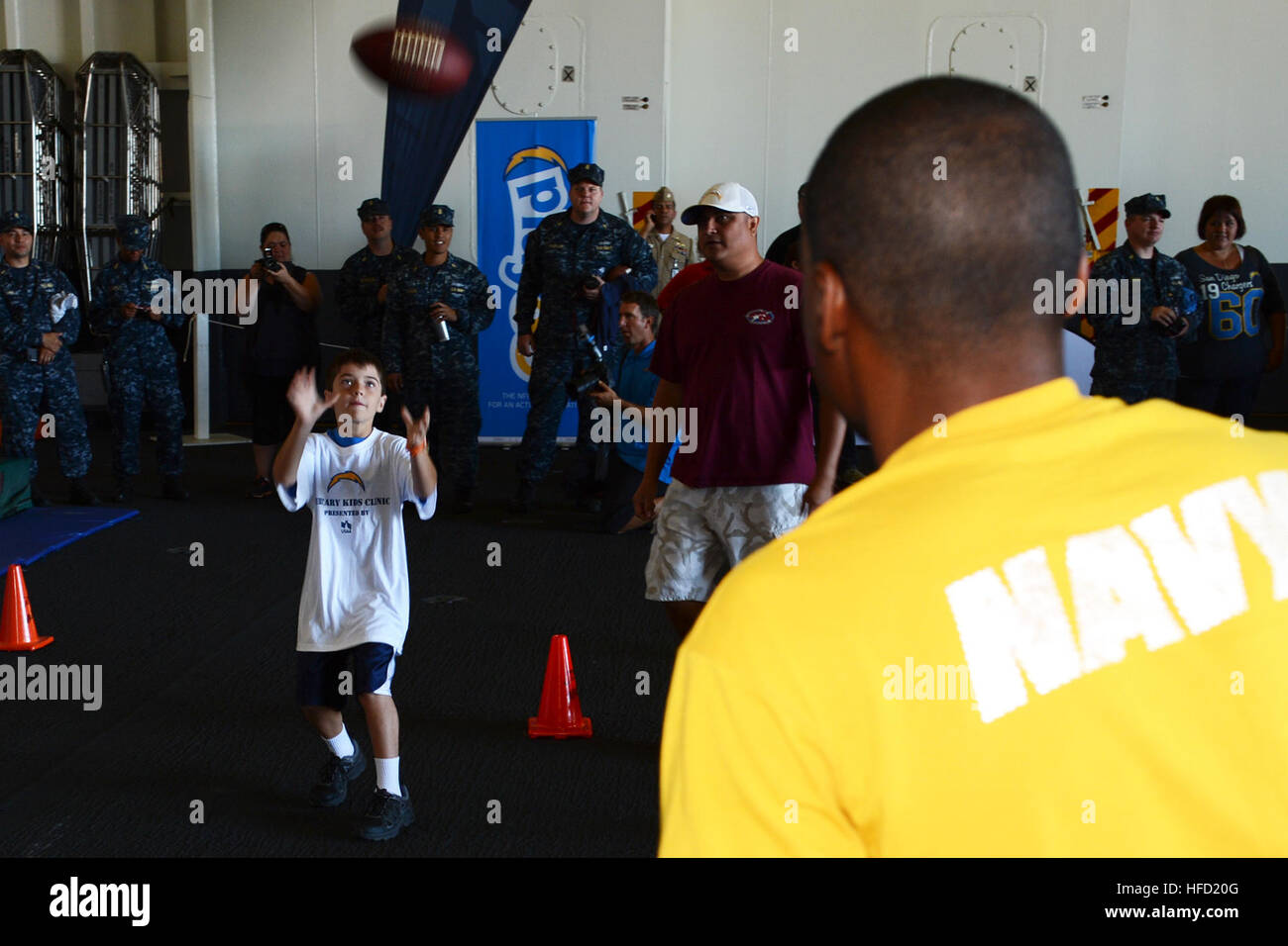 Children of sailors assigned to the aircraft carrier USS Ronald Reagan ...