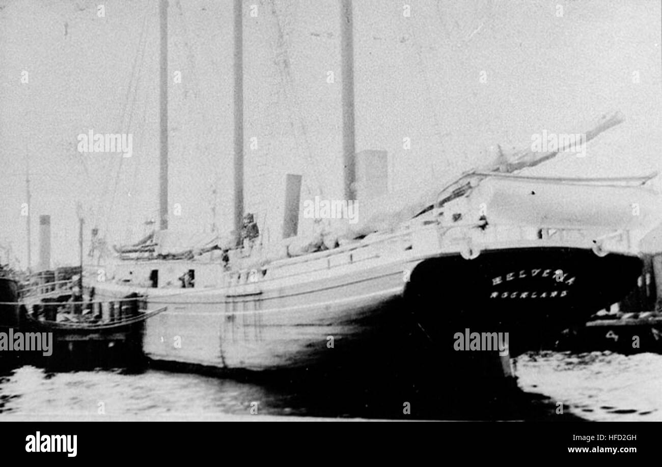 The schooner Helvetia is shown from the stern, highlighting its rigging ...