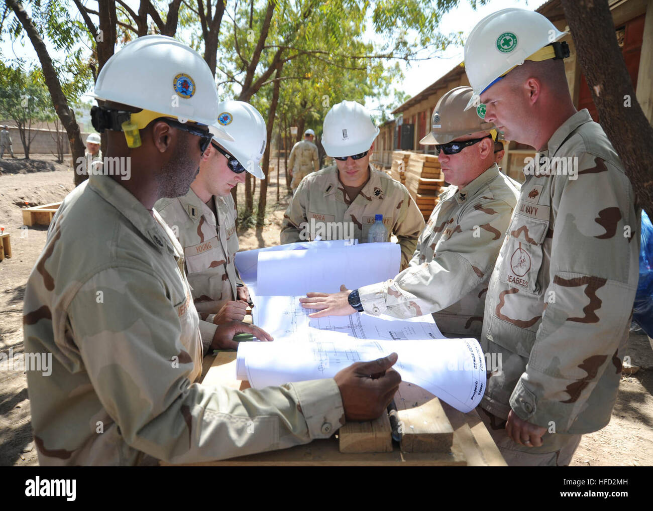 From left; Chief Builder Christopher Jefferies, Lt.j.g. Jordan Young ...