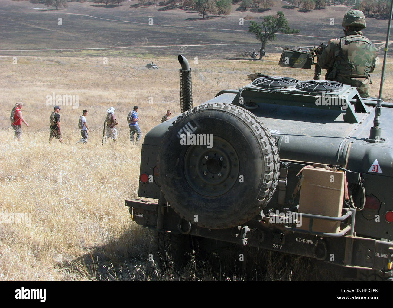 A Seabee attached to Naval Mobile Construction Battalion (NMCB)- 5 mans ...