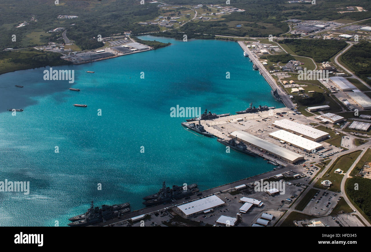 An aerial view of U.S. Naval Base Guam shows Apra Harbor with a large ...