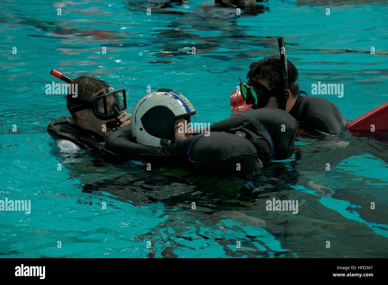 An instructor leads students at the Search and Rescue Swimmer School at ...