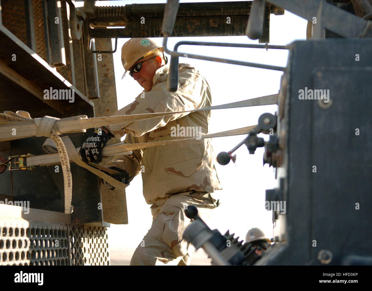 U.S. Navy Equipment Operator 2nd Class Lester Maurer, assigned to Naval ...
