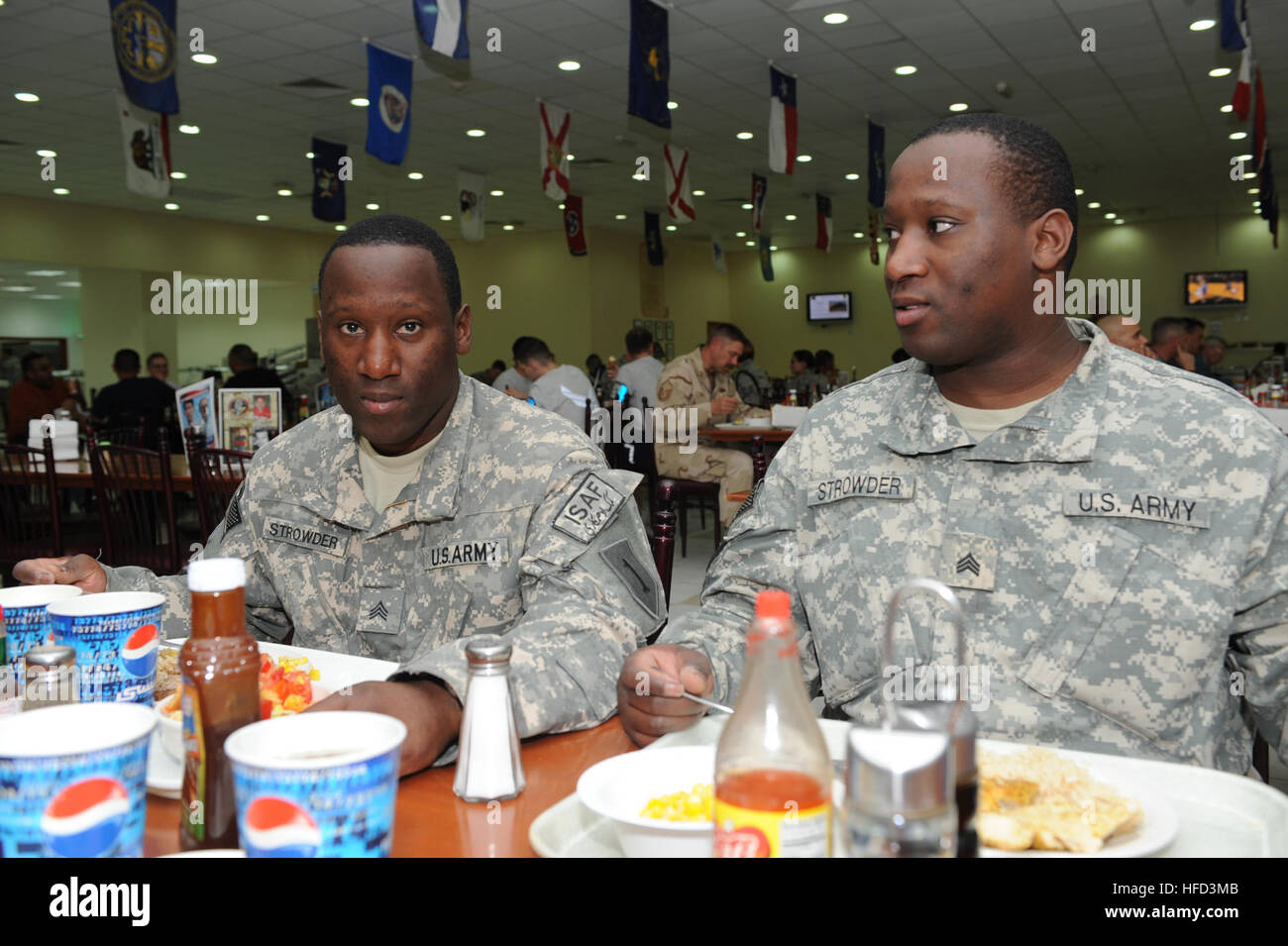 Sgt. Ronald J. Strowder (left) looks at his twin brother Sgt. Donald J ...