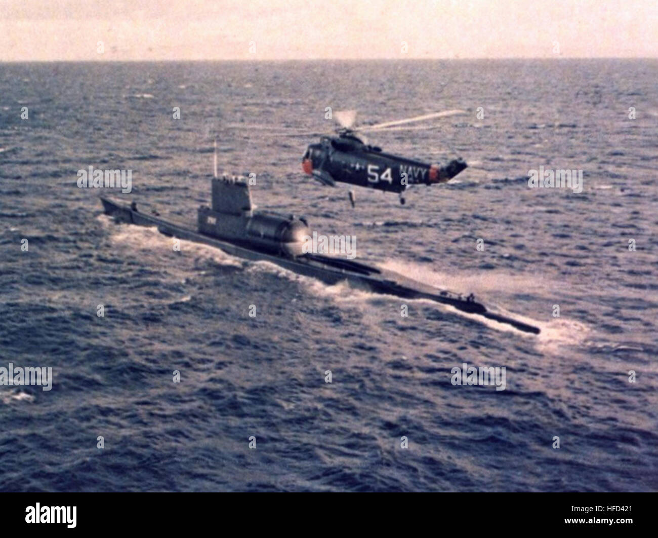 SH-3A Sea King of HS-4 flies over USS Tunny (SSG-282) c1964 Stock Photo ...