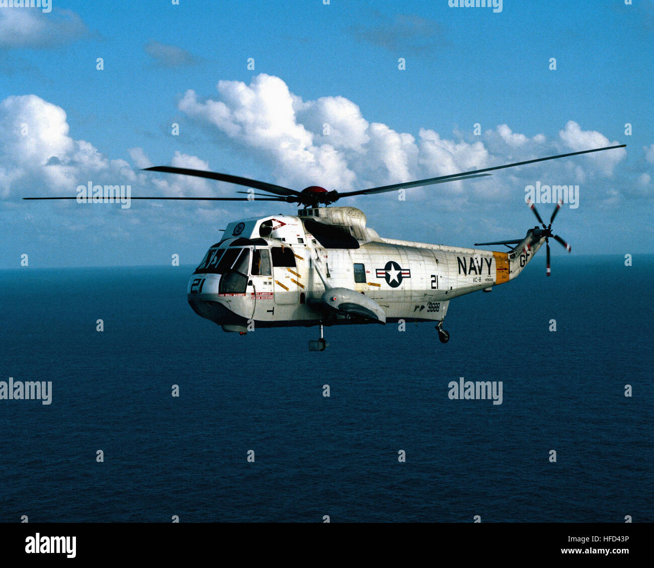 An air-to-air left front view of an SH-3G Sea King helicopter from ...