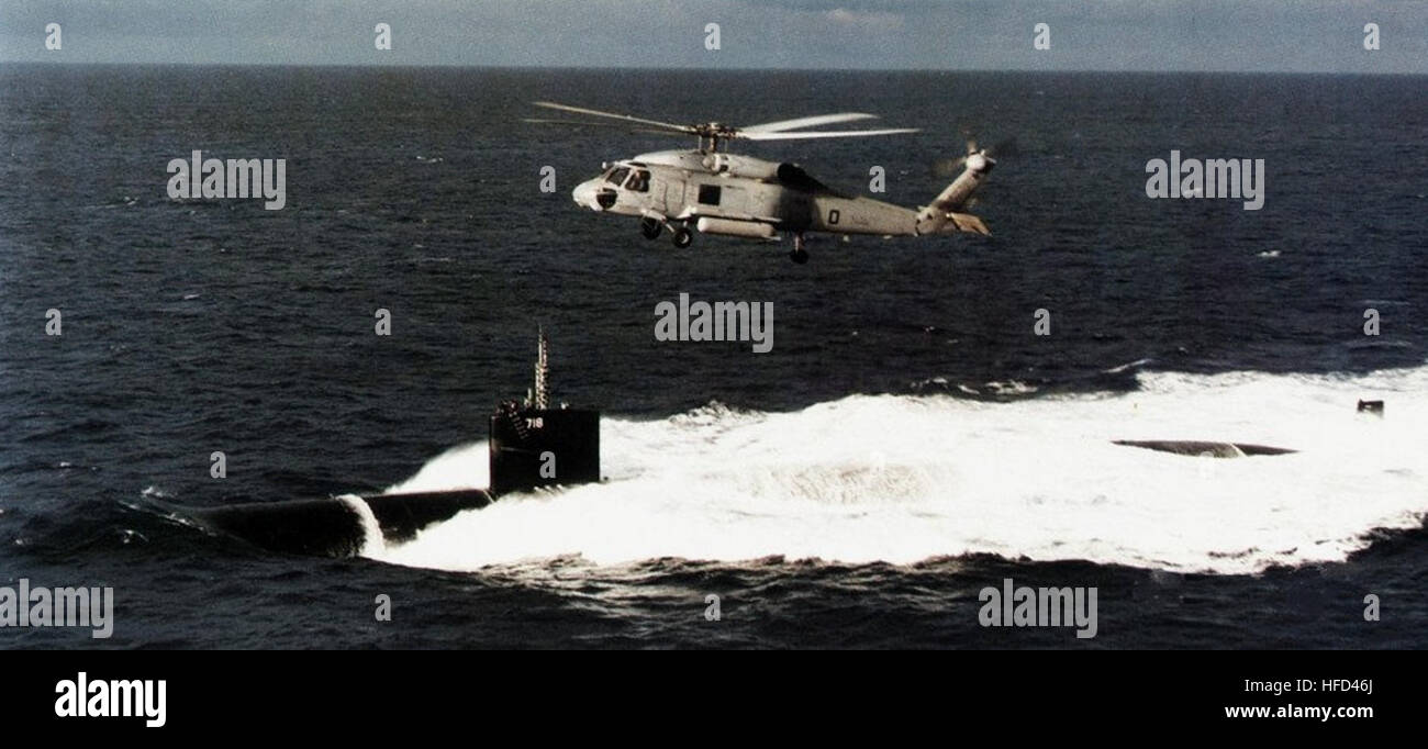 SH-60F HS-4 hovering over USS Honolulu (SSN-718) 1992 Stock Photo - Alamy