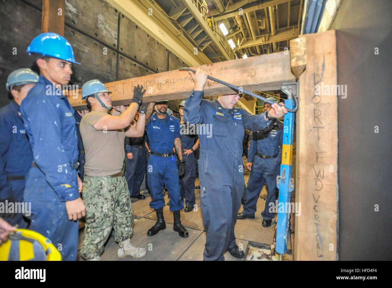 Chief Damage Controlman Elias Robles, and Sailors attached to the ...