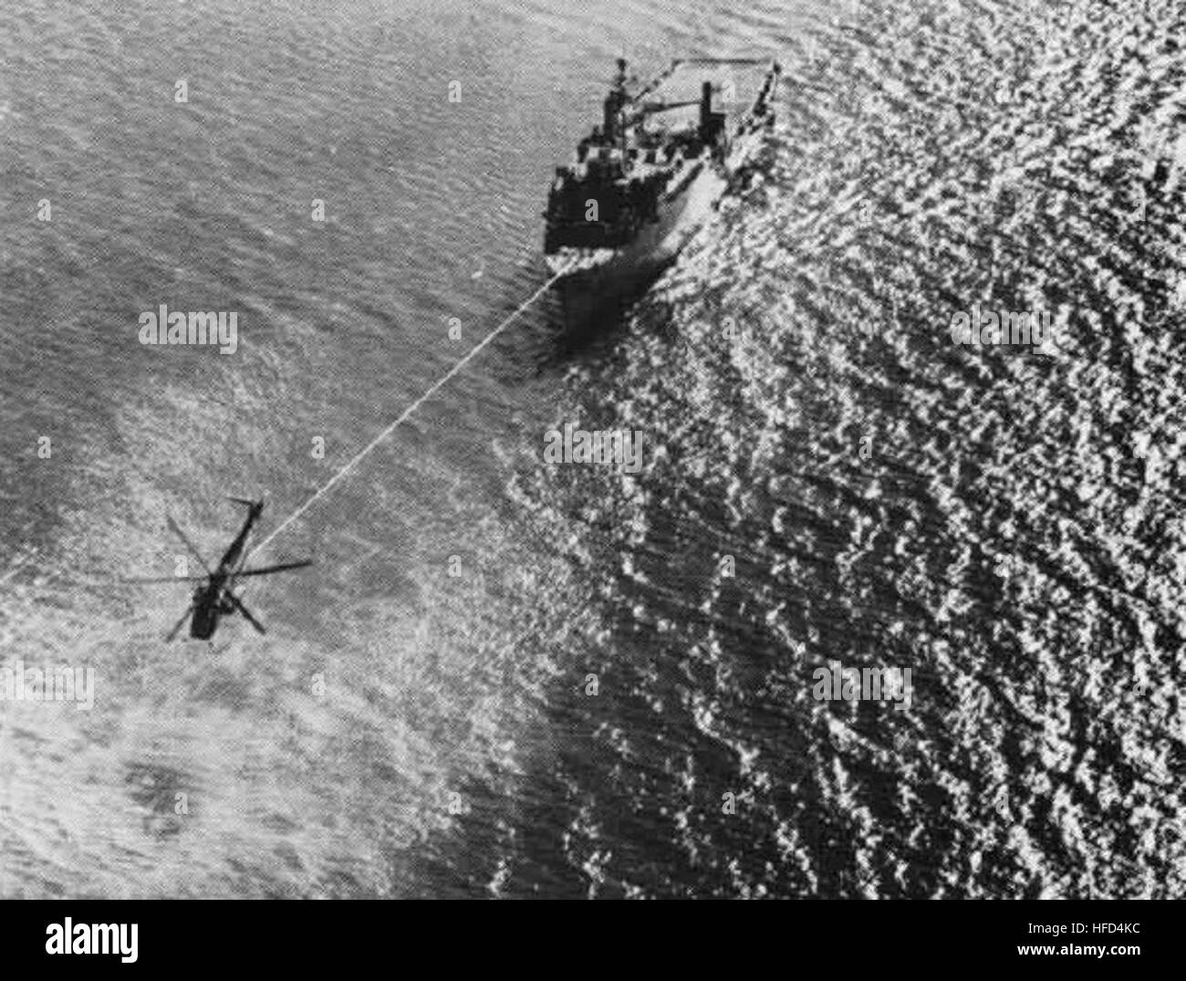 A Sikorsky RH-53A helicopter conducts lift operations with a landing ...
