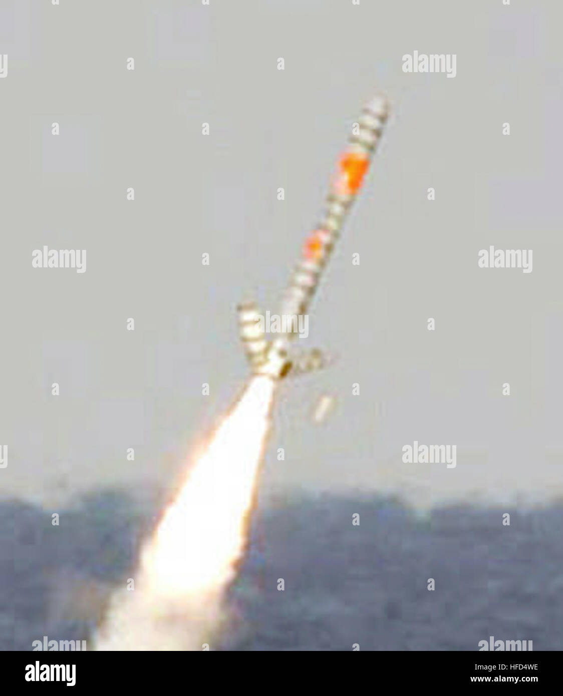 A Tomahawk Land Attack Missile (T-LAM) is launched from the US Navy ...