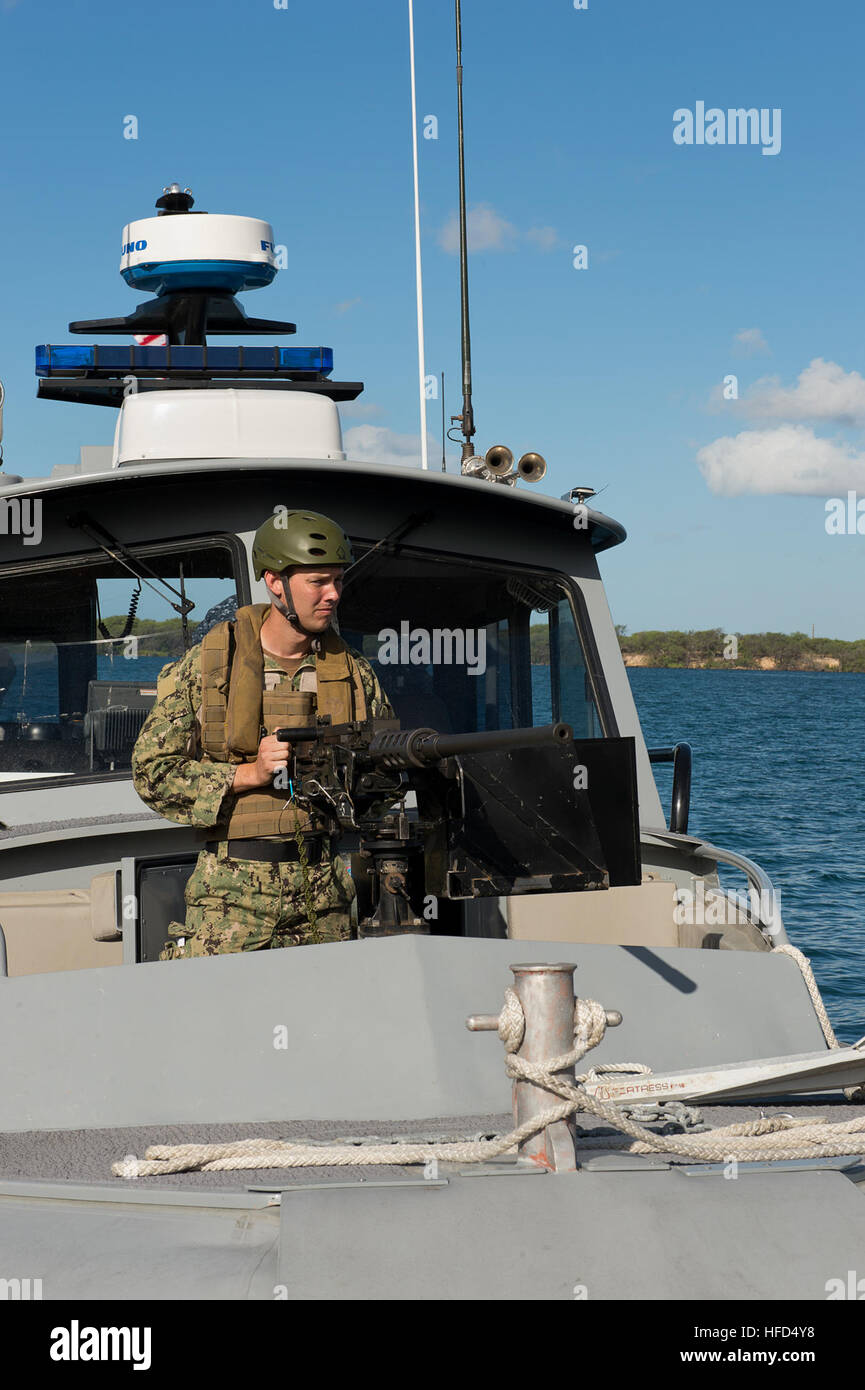 Master-at-Arms 2nd Class Josh Rognlie, assigned to Coastal Riverine ...