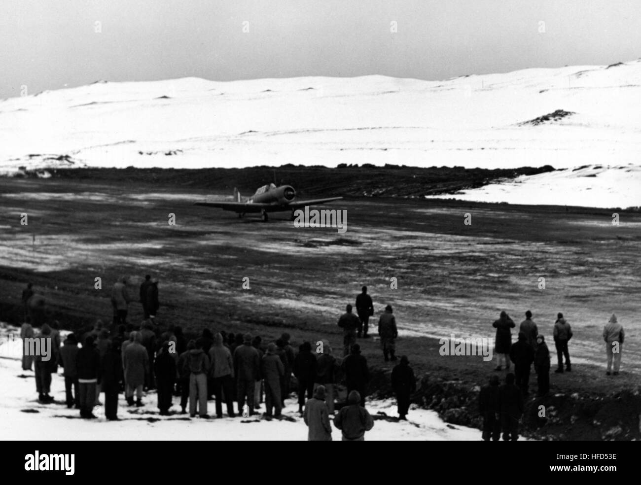 A SNJ Texan military trainer aircraft lands at Naval Air Station Adak ...