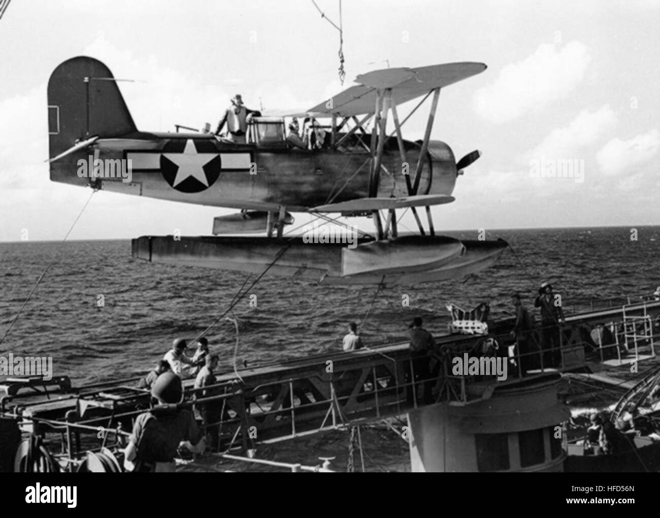 SOC is lowered on cat of USS Minneapolis (CA-36) 1943 Stock Photo - Alamy