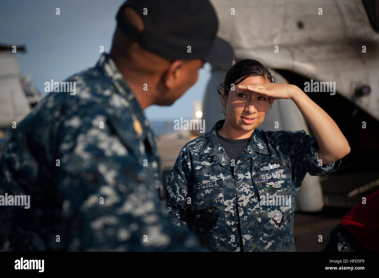 Petty Officer 1st Class Garnet Valenzuela has a discussion with Chief ...