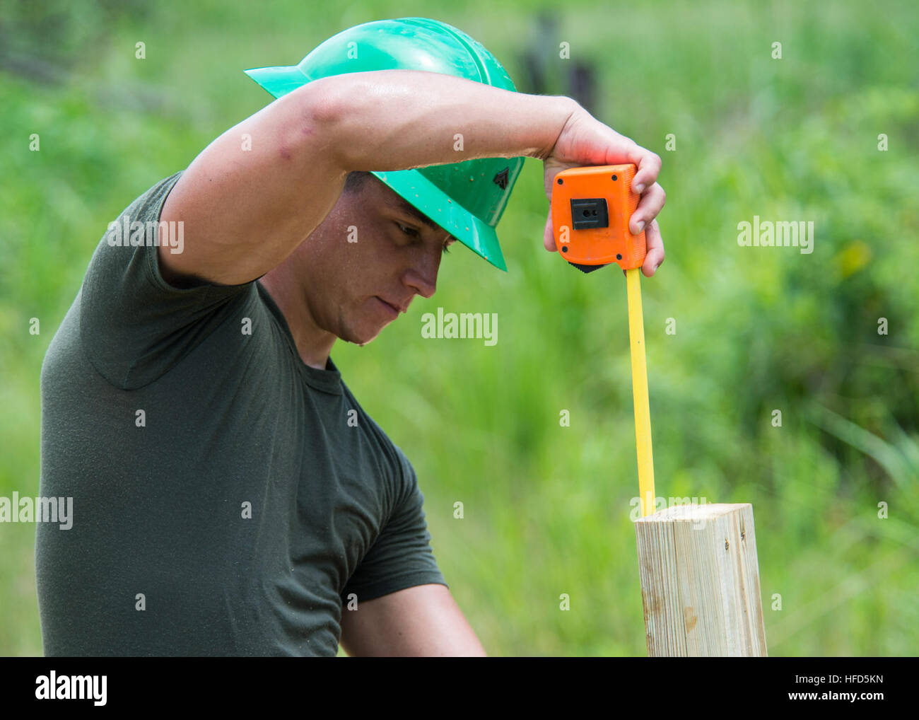 U.S. Marine Corps Cpl. Michael O. Smith performs renovations on Bethel ...